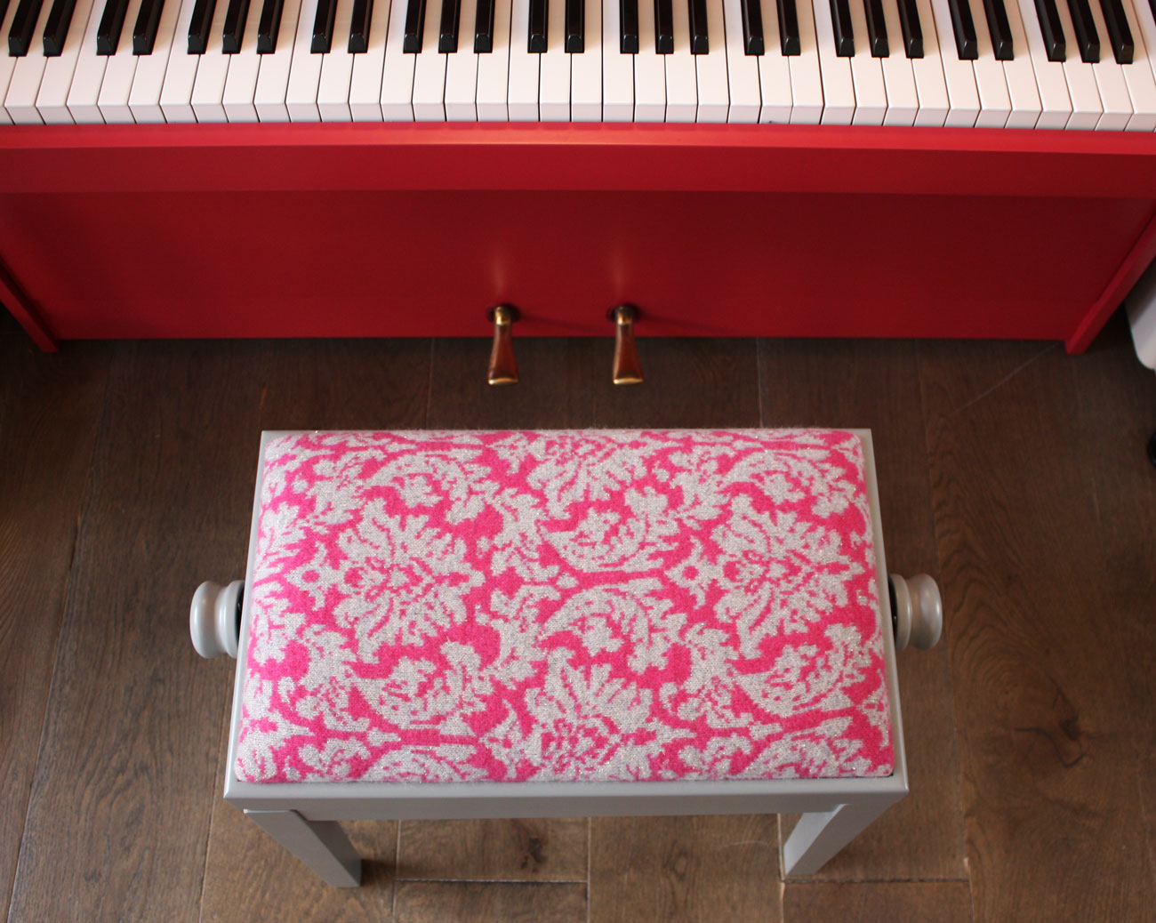 Piano stools featuring fabric by Sue Bradley